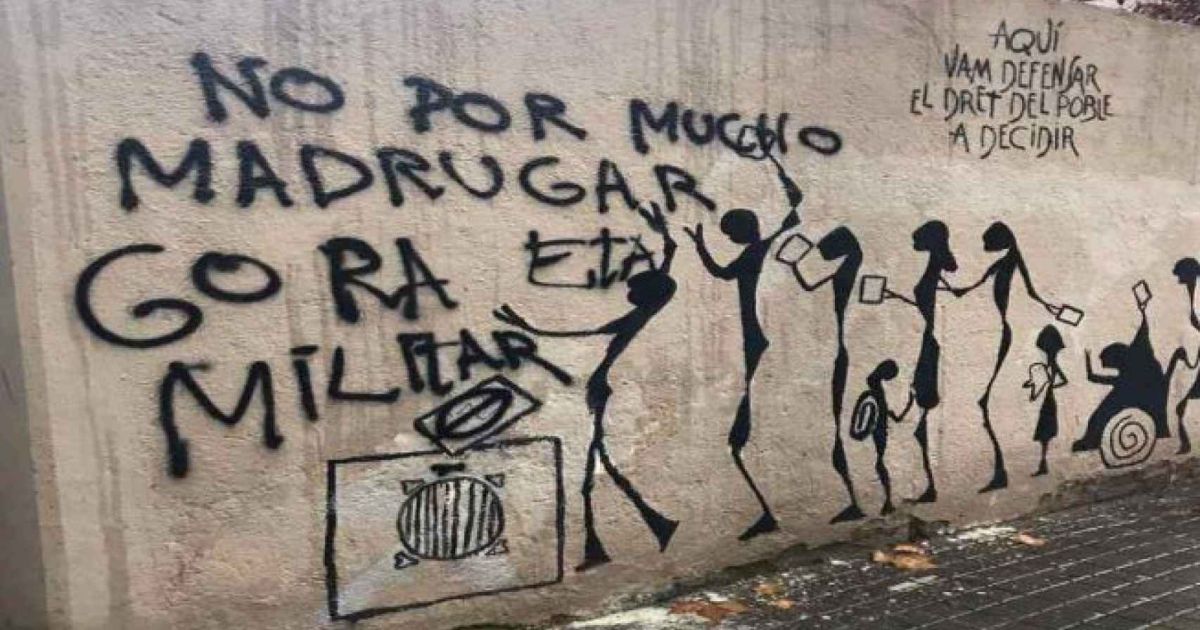Pintada a favor de ETA militar en un mural del 1-O